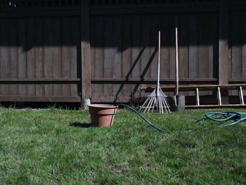 Rake, Shovel and Hose stock image. Image of bucket, gardening - 106937789