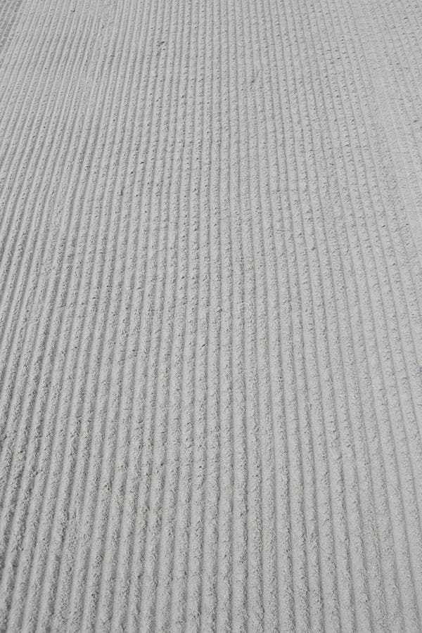 Raked beach sand, vertical stock image. Image of sand - 193256379