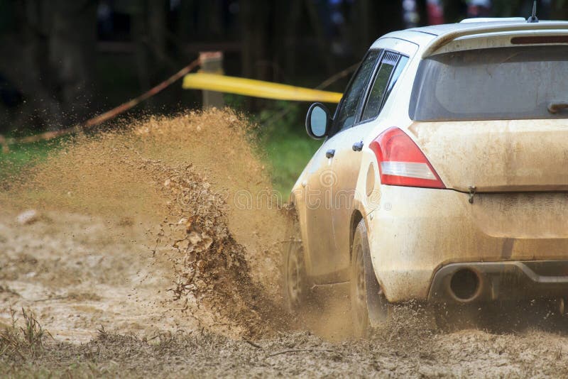 Rally car in muddy road stock photo. Image of autosports - 80417566
