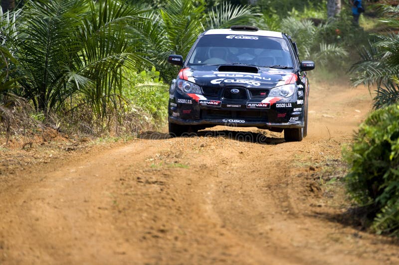 Rally car racing on track editorial stock photo. Image of tropics - 6711163