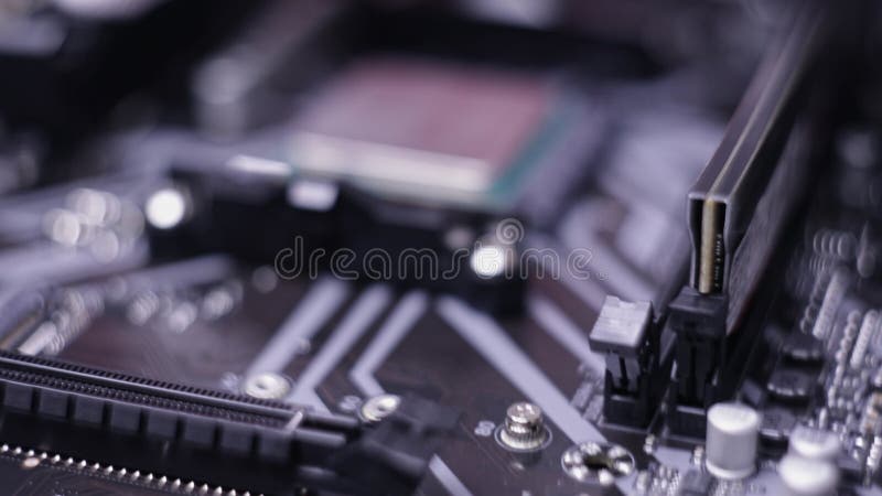 RAM on the Motherboard with the Processor CPU. Assembling a Computer ...