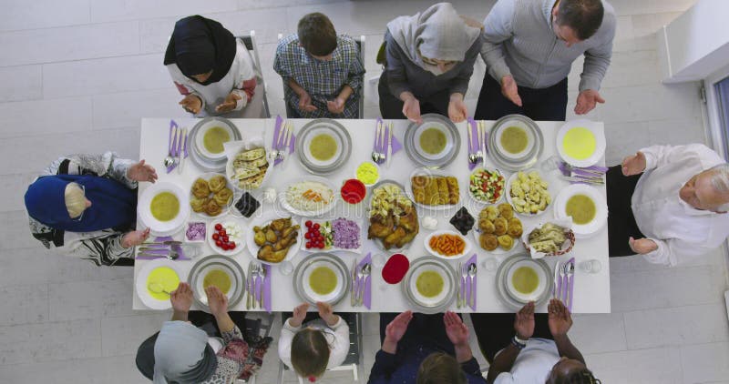 Family Gathering Eating Dinner at Home during Ramadan Stock Footage ...