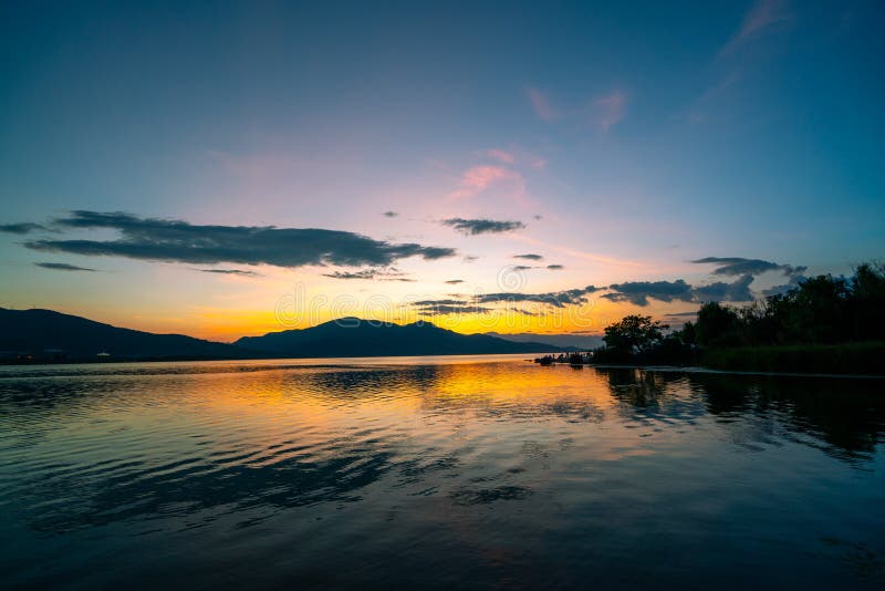 Dramatic Panorama Evening Sky and Clouds Over Lake at Sunset Stock ...