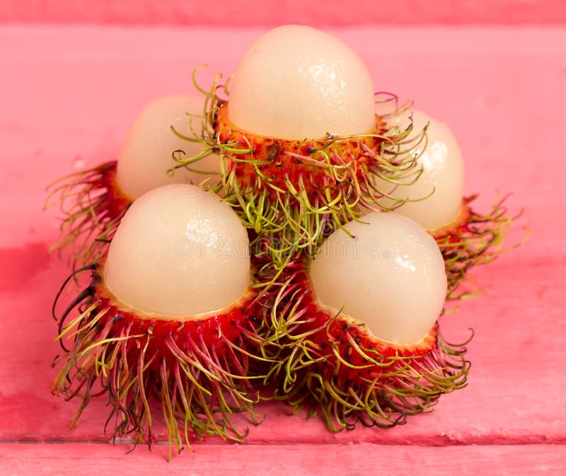 Rambutan Fruit on Wood Color Pink Stock Image - Image of fruit ...