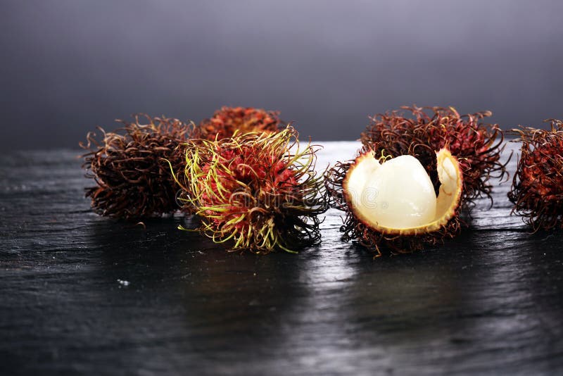 Rambutans Fruit with Leaf on Table. Rambutan or Hairy Lychee Stock ...