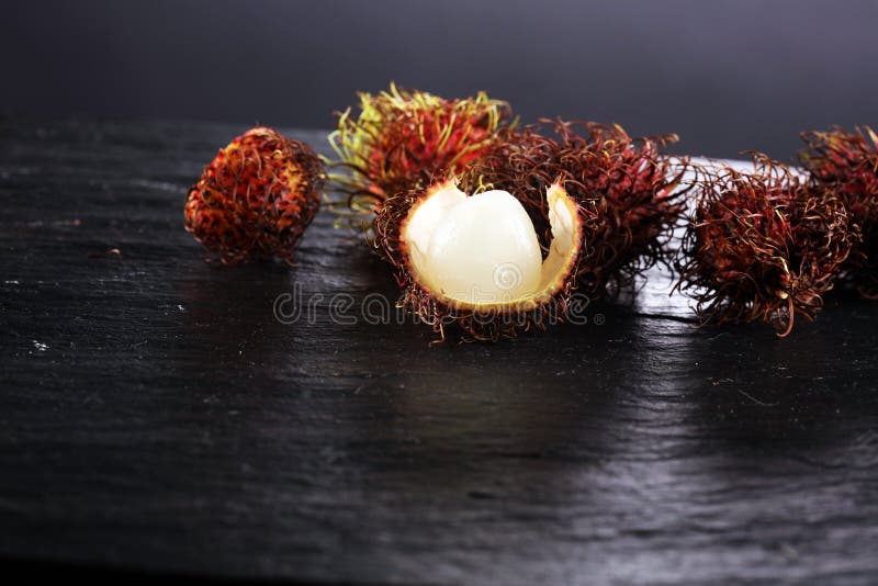 Rambutans Fruit with Leaf on Table. Rambutan or Hairy Lychee Stock ...