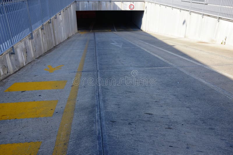 Ramp Access Underground Parking Stock Image - Image of basement, ramp ...