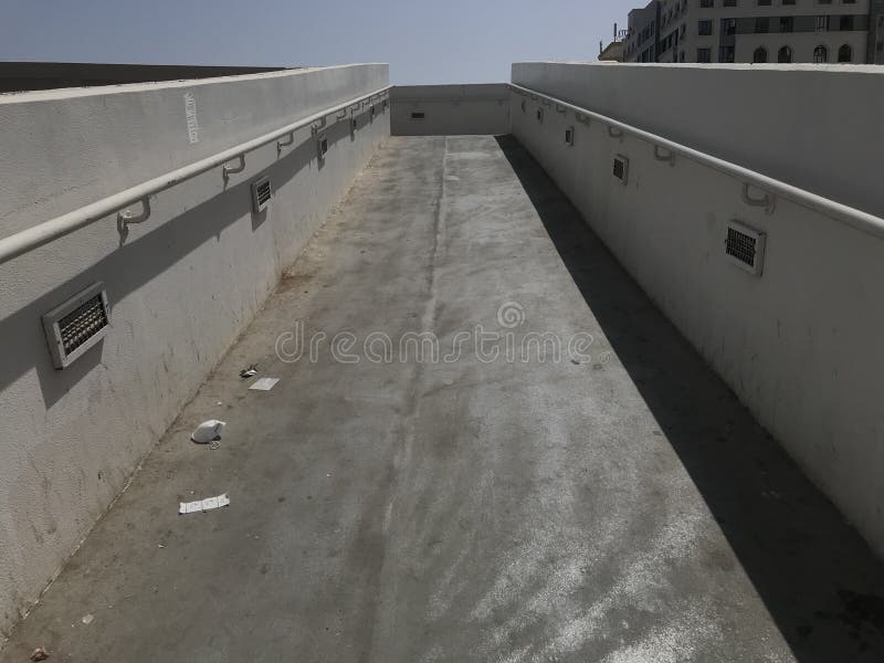 Ramp Construction with Plain with Wall Mounted Hand Rails Both Sides ...