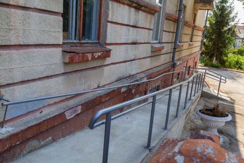 A Ramp with a Smooth Descent for People with Limited Mobility and ...