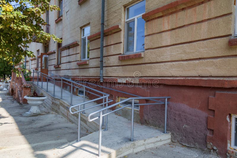 A Ramp with a Smooth Descent for People with Limited Mobility and ...