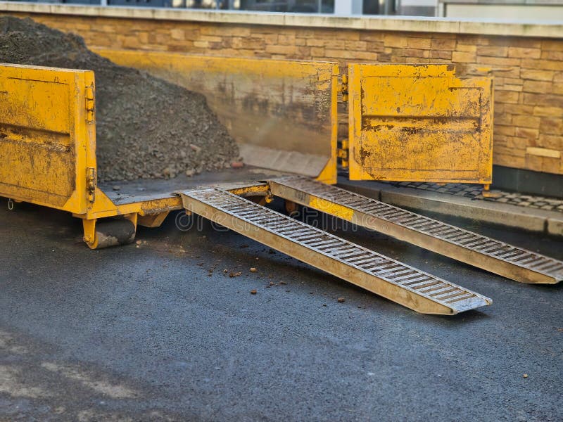 Ramps for a Loader Carrying Soil into a Stock Image - Image of ...