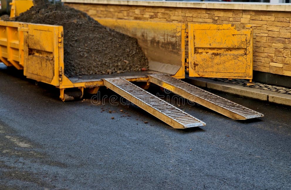 Ramps for a Loader Carrying Soil into a Stock Image - Image of ...