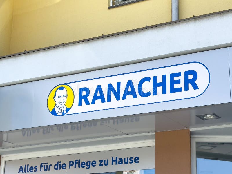 Ranacher Storefront Signage on Yellow Building Exterior Editorial ...