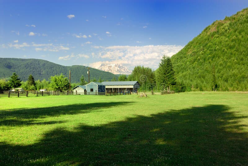 Ranch in the valley stock image. Image of shadow, mountain - 976499