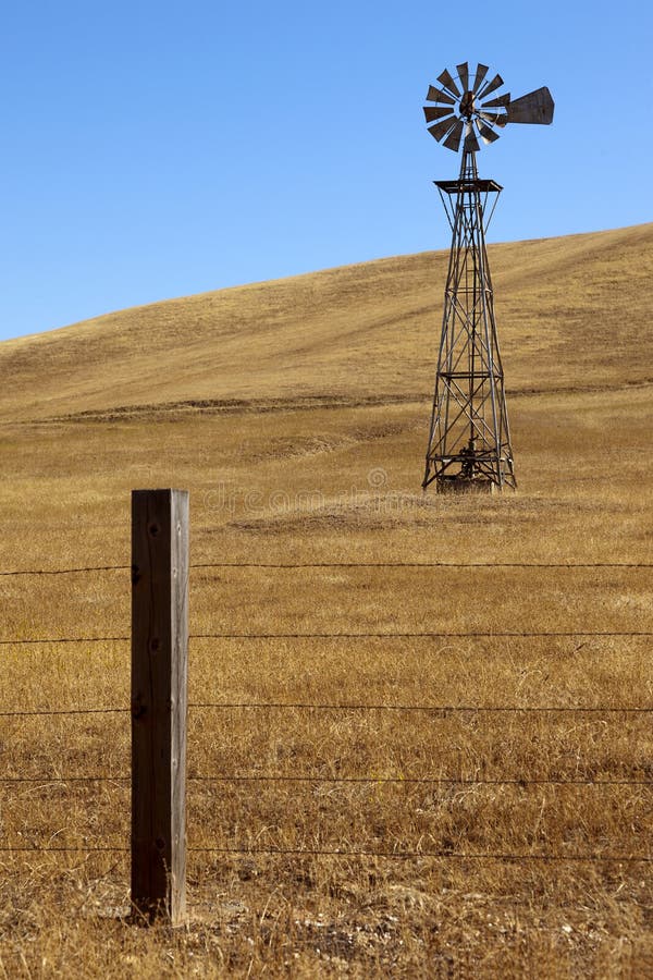 Ranch Windmill stock image. Image of american, blue, cattle - 2361819