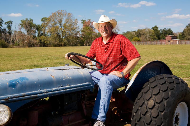 Guapo Ranchero Con Un Sombrero De Vaquero Sentado En Una Jaula ...
