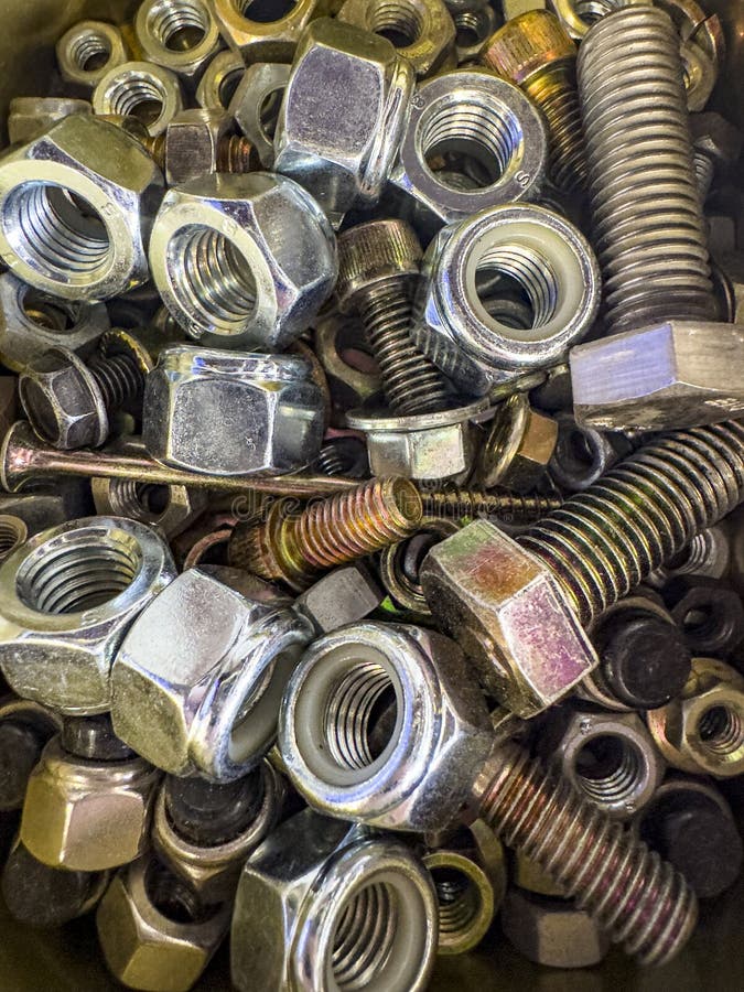 Random nuts and bolts 2 stock photo. Image of machine - 341678478