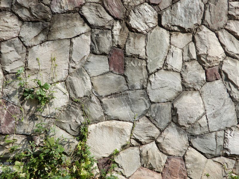 Random sized stone wall stock photo. Image of craftsmanship - 207988454
