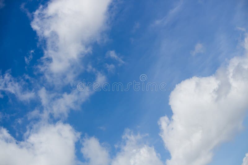 Random White Clouds in the Blue-sky Backdrop. Stock Photo - Image of ...