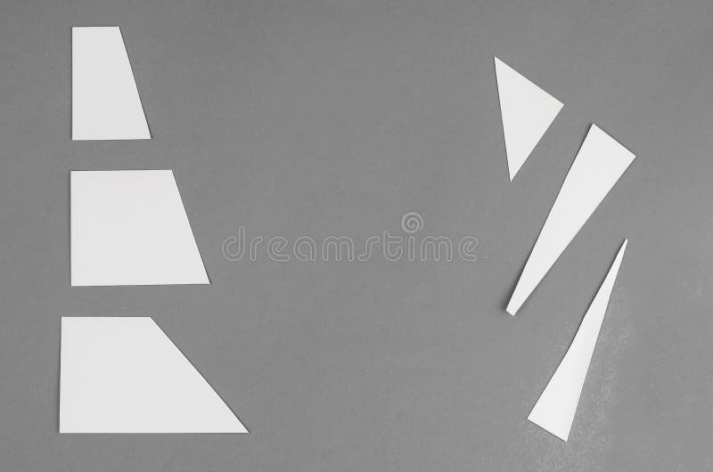 Random White Geometric Shapes on Gray. Trapezoids and Triangles Stock ...