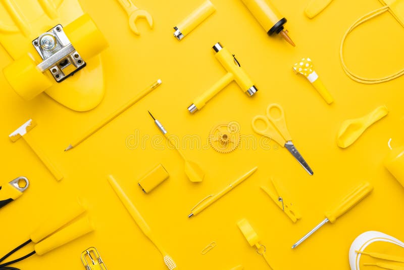 Top View of Random Yellow Objects in Order on Yellow Background Stock ...