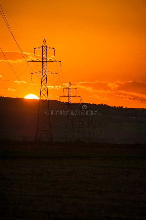 Power Line Towers at Sunset Stock Image - Image of electrical, high ...