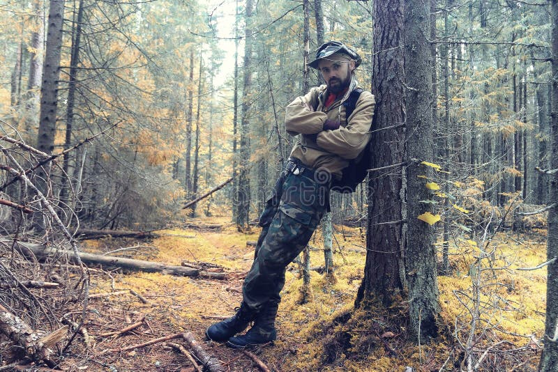 Ranger in autumn forest stock image. Image of fashion - 64402585