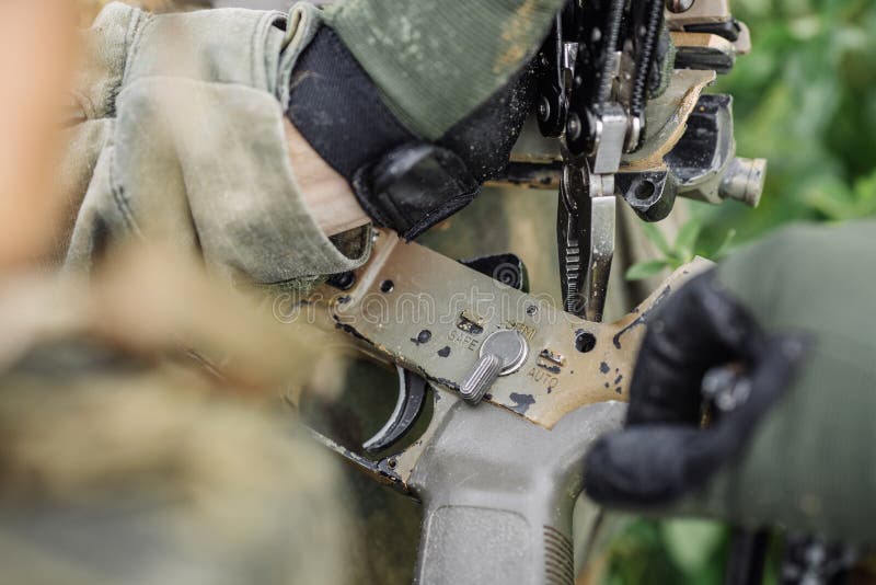 Ranger Repair Fix the Rifle with the Tool Stock Image - Image of ...