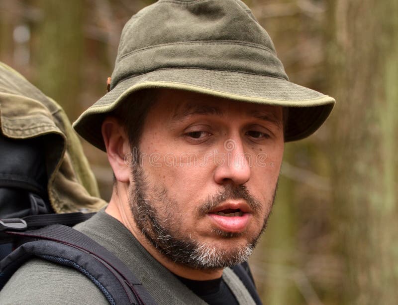 Ranger speaking sadly stock image. Image of forest, rucksak - 69592667