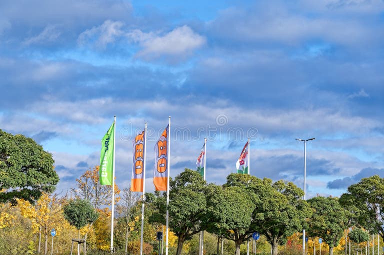 Flags of a Hardware Store in Germany in Front of a Blue Sky Editorial ...