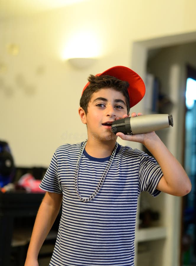 Raper Boy with microphone stock image. Image of singer - 58400861