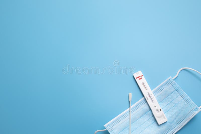 Rapid Coronavirus Test on the Blue Background. Negative Test Result by ...