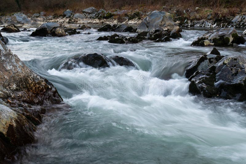 Rapid Creek Flow Around Wet Rocks Stock Photo - Image of mountain ...