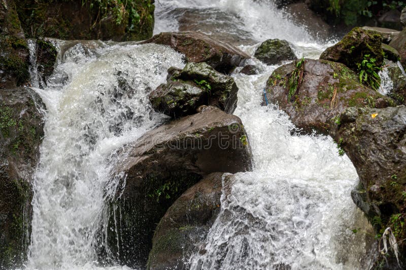 Rapid and Powerful Water Flow between Large Rocks in Cold Mountain ...