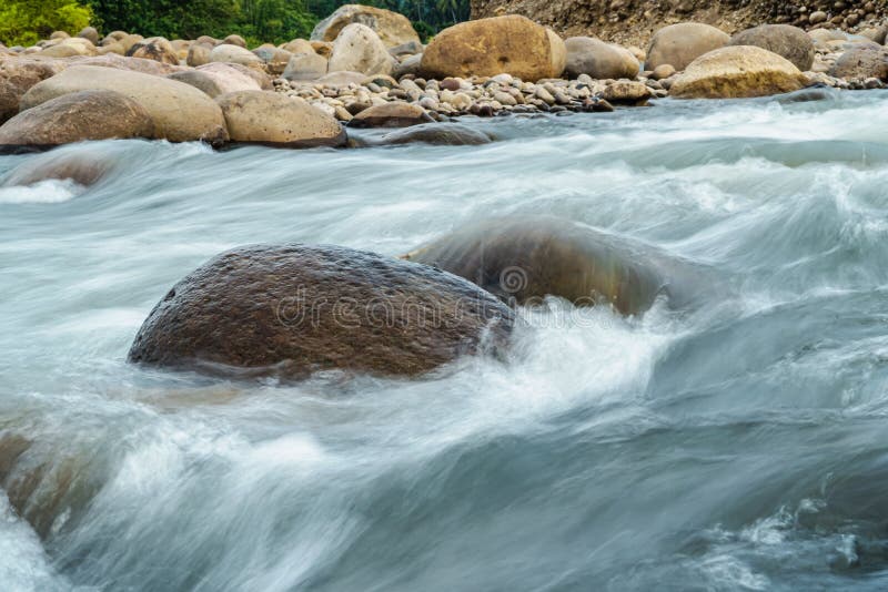 Rapid and Powerful Water Flow between Rocks Stock Photo - Image of ...