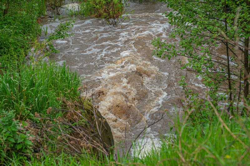 A Rapid Stream of Muddy Rain Water Stock Photo - Image of problem, rain ...