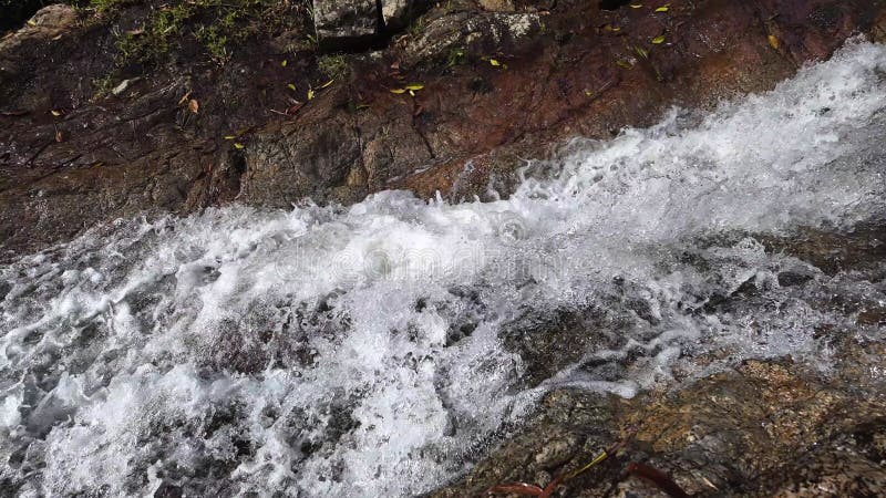 Rapid Water Stream Flowing from Cascade through the Rocks Under ...