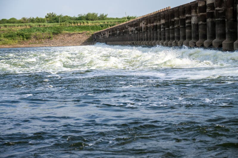 Rapidly Flowing Water with Large Waves Over a Dam on a River, Water ...
