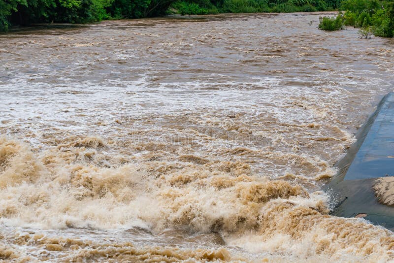 Rapids on a muddy river stock photo. Image of scenery - 257824646