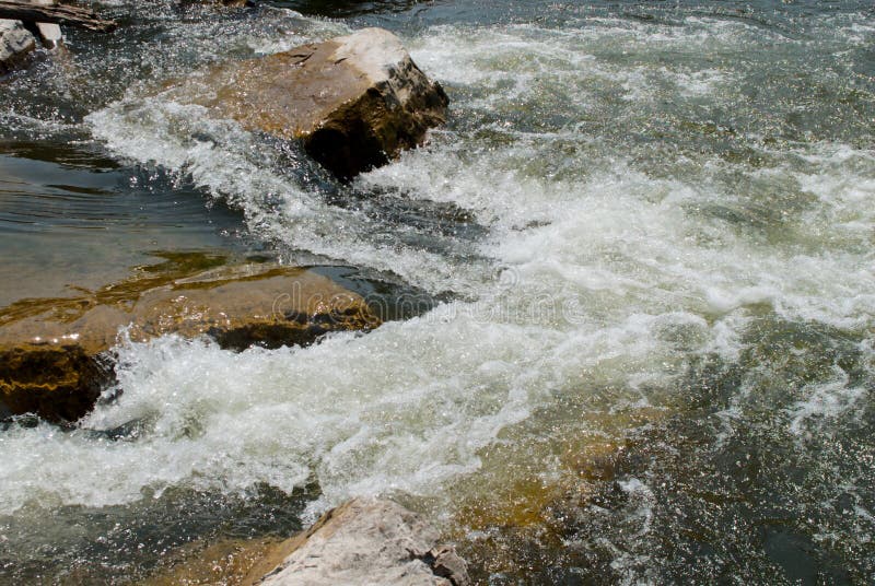 Rapids and rocks in river stock image. Image of creek - 34200227