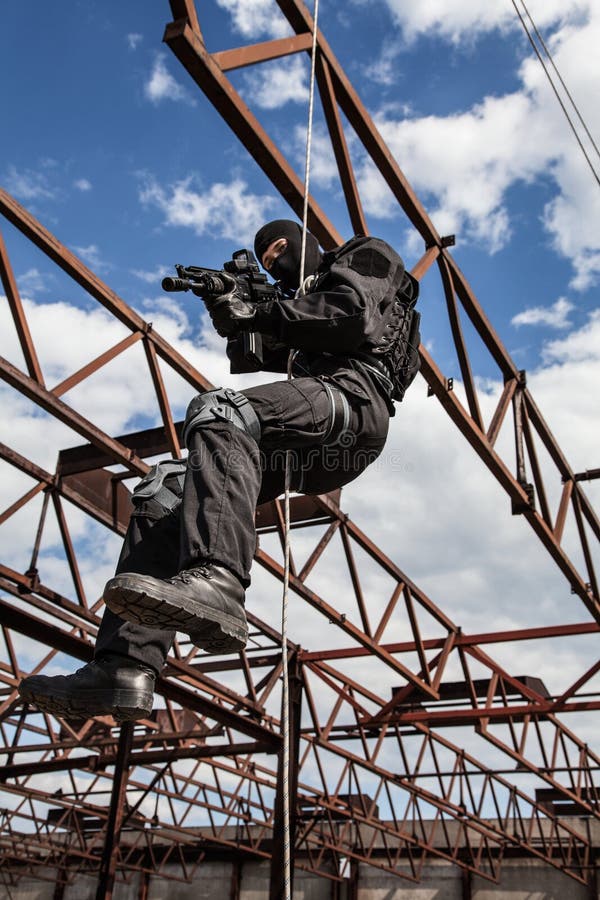 Rappeling assault stock image. Image of policeman, rappelling - 58274975
