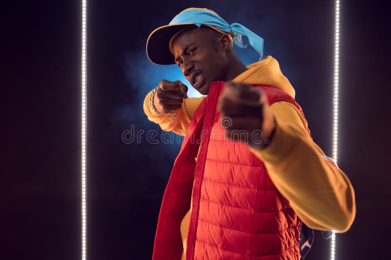 Rapper Poses in Studio with Linear Illumination Stock Photo - Image of ...