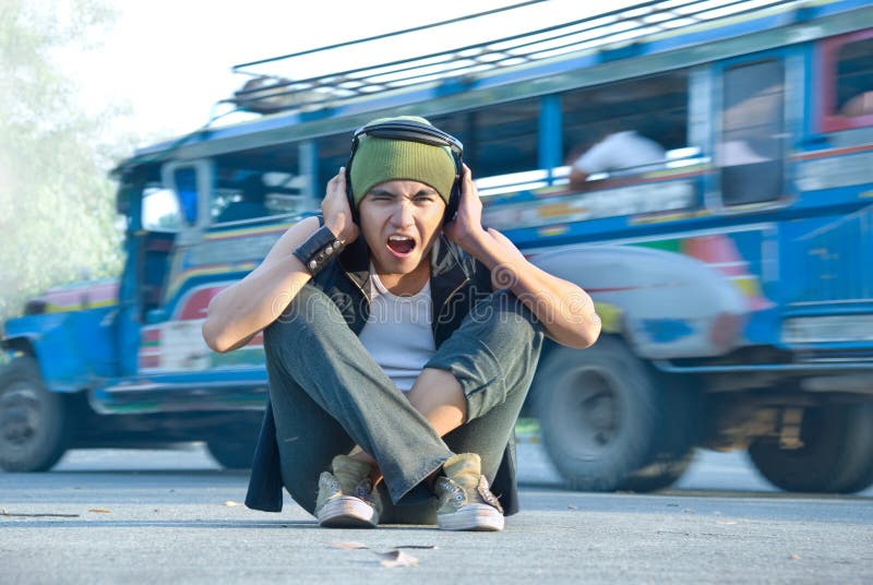 Suburban Rapper Sitting on Street Stock Photo - Image of pose, gangsta ...