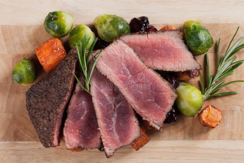 Rare Beef Steak with Carrot and Brussel Sprout Stock Image - Image of ...