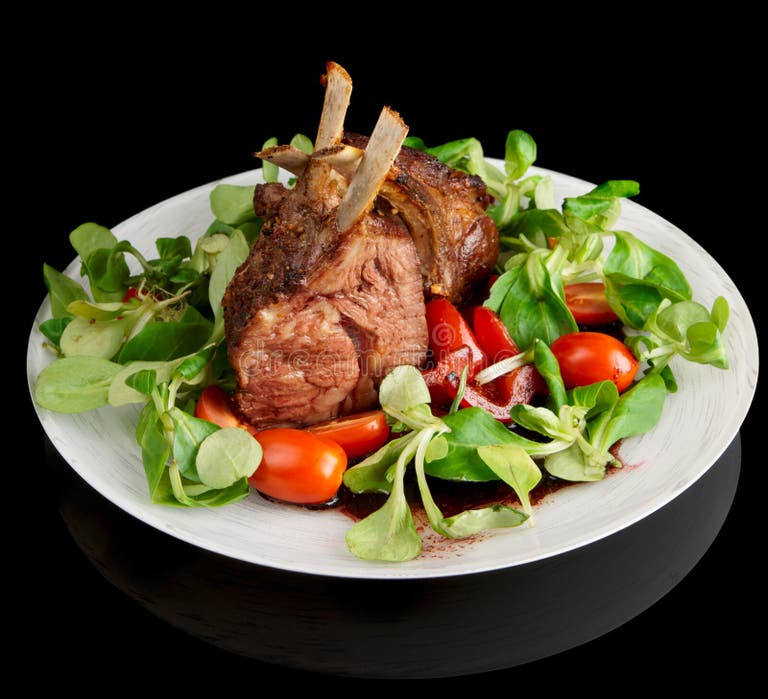 Rare Fried Rack of Lamb Isolated on Black Stock Image - Image of ...