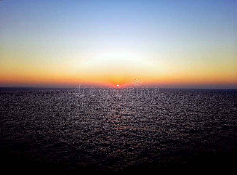 A rare sunset view stock photo. Image of dusk, ocean - 262656512