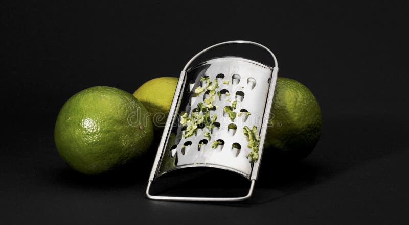 Rasp with limes stock photo. Image of steel, grate, yellow - 301584