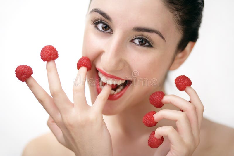 Raspberries stock image. Image of finger, female, alone - 27809841