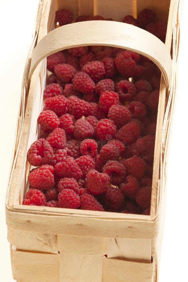 Raspberries in basket stock photo. Image of close, fruit - 10668966