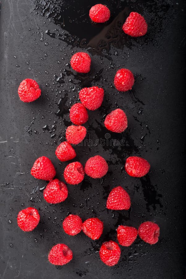 Raspberries on Black Slate stock image. Image of raspberries - 51423521